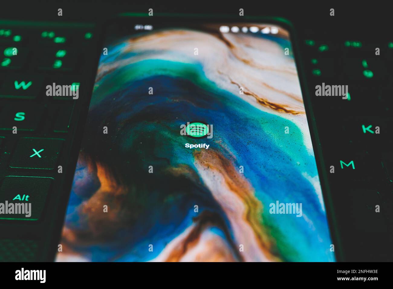 Spotify music app on smartphone screen. Close up shot of Spotify music ...