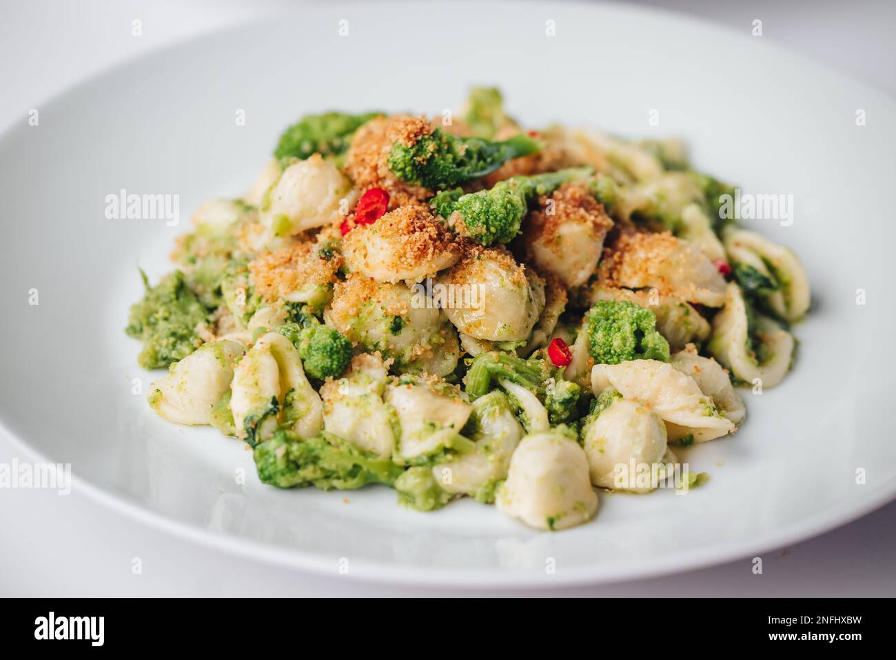 Traditional Orecchiette with cime di rapa pasta from Puglia Stock Photo ...