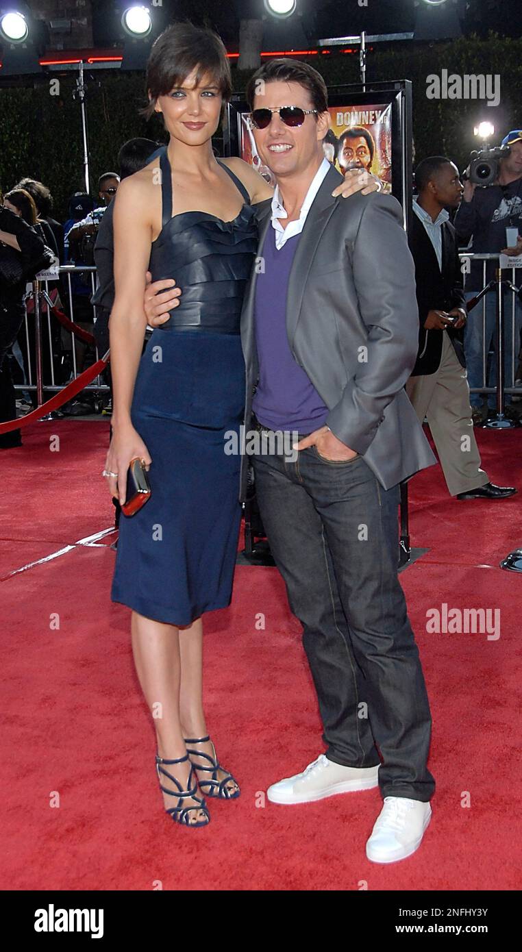 Actor Tom Cruise, right, and actress Katie Holmes pose on the press ...