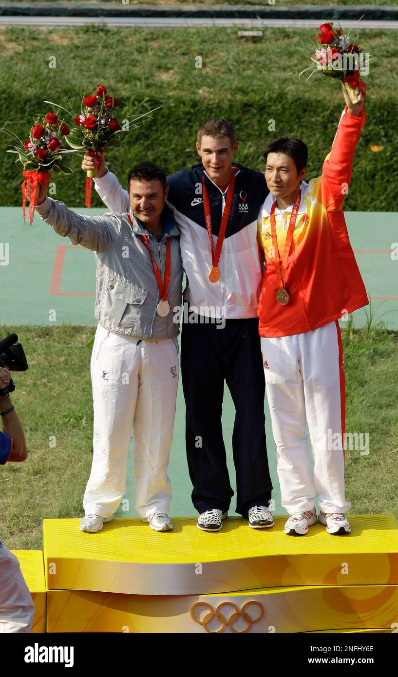 Gold medalist Walton Eller, center, of the United States, silver ...