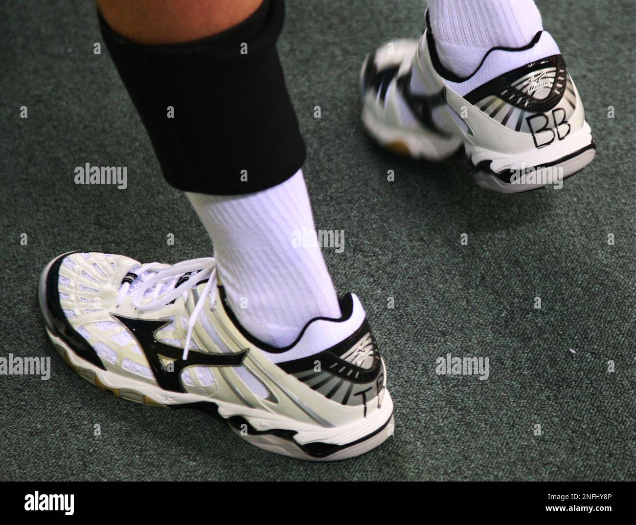 The shoes of a member of the United States men's volleyball team are ...