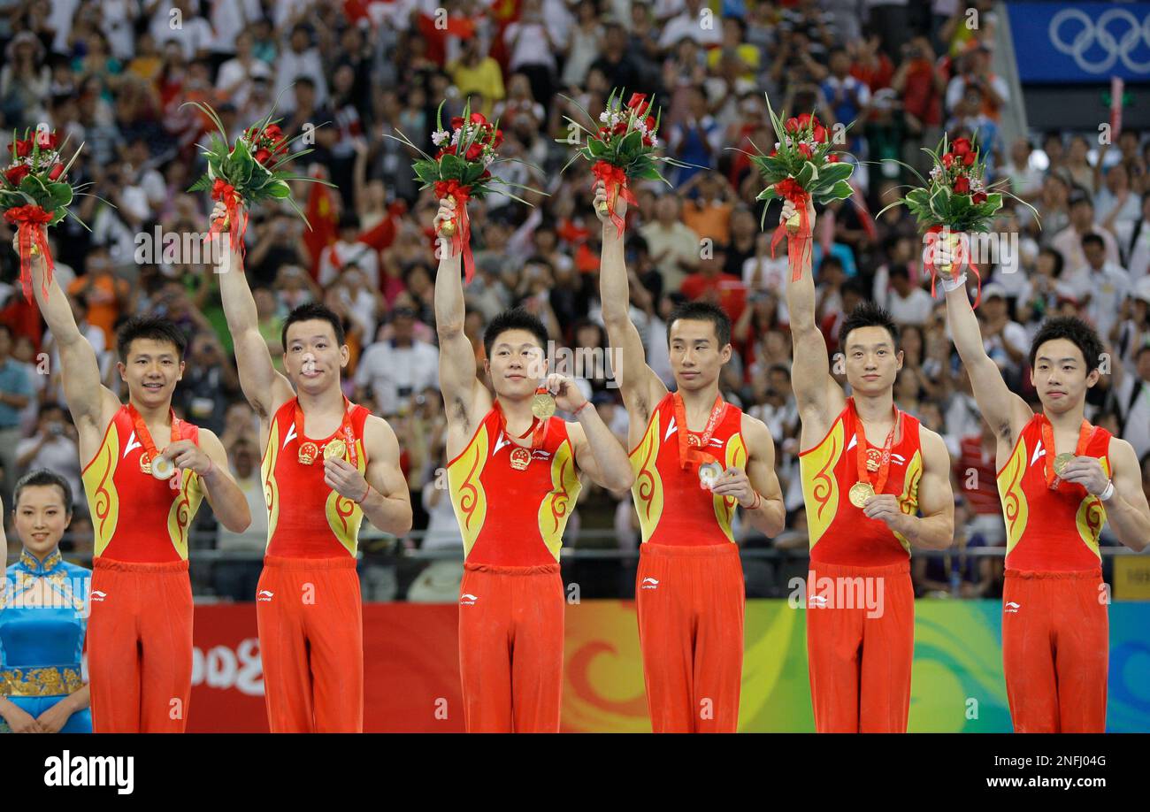 China's gymnasts Zou Kai, Yang Wei, Xiao Qin, Li Xiaopeng, Huang Xu and ...