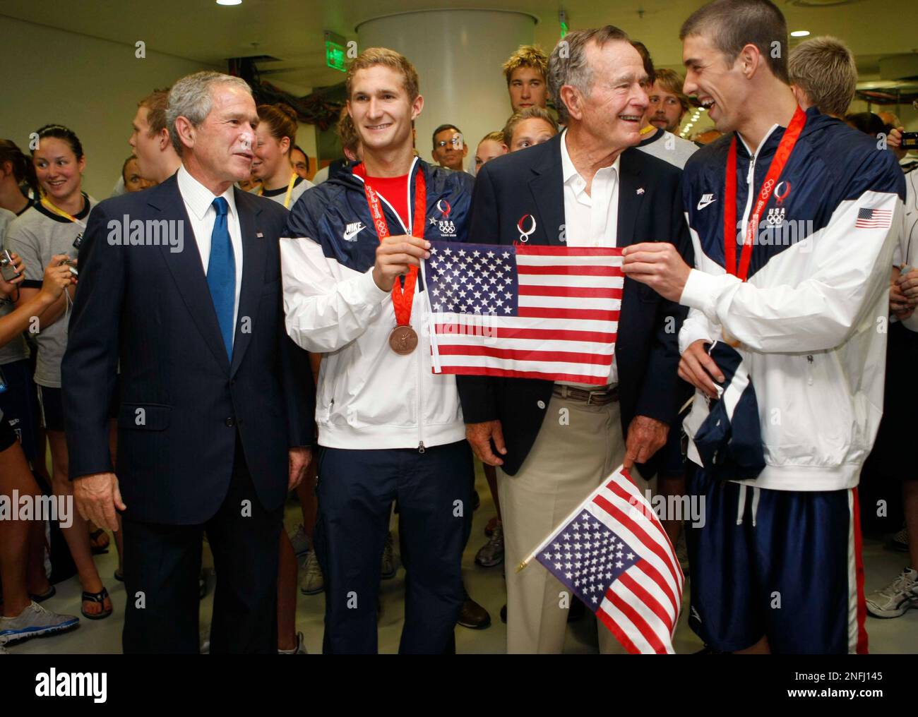 President Bush and former President George H.W. Bush greet gold medal ...