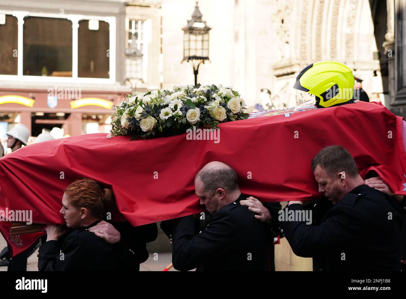 The coffin of Barry Martin is carried out of St Giles' Cathedral in ...