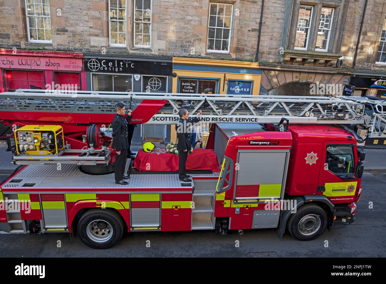 Firefighter Barry Martin's cortege makes it way through Royal Mile to ...