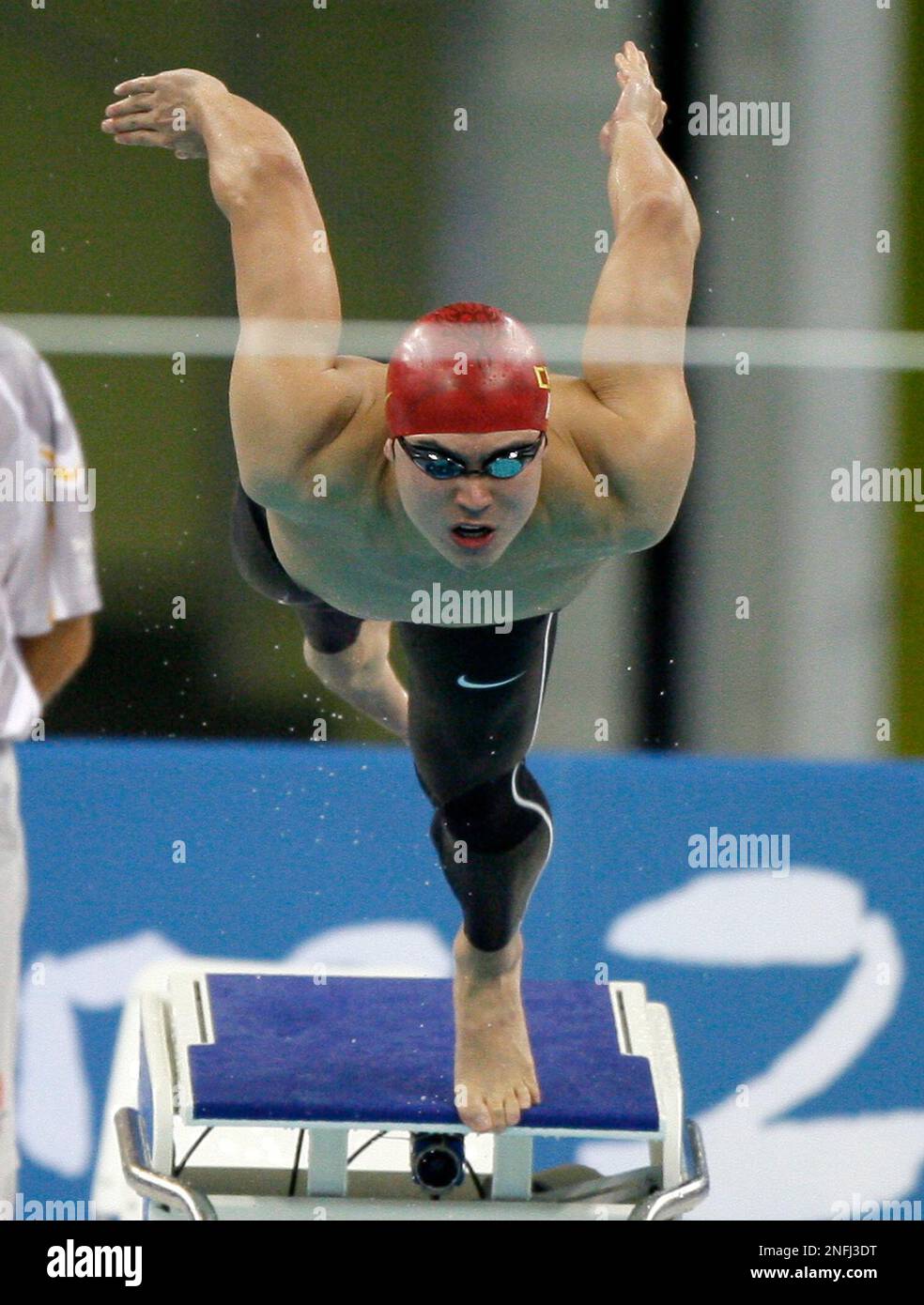 China's Wu Peng swims in a men's 200-meter butterfly heat during the ...