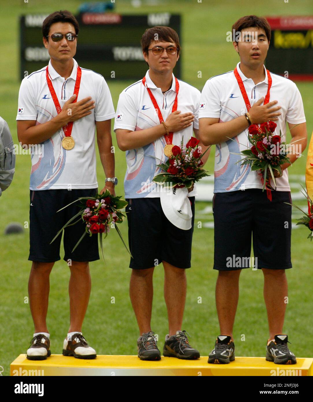 South Korea's Park Hyung-Mo, left, Lee Chang-Hwan, center, and Im Dong ...