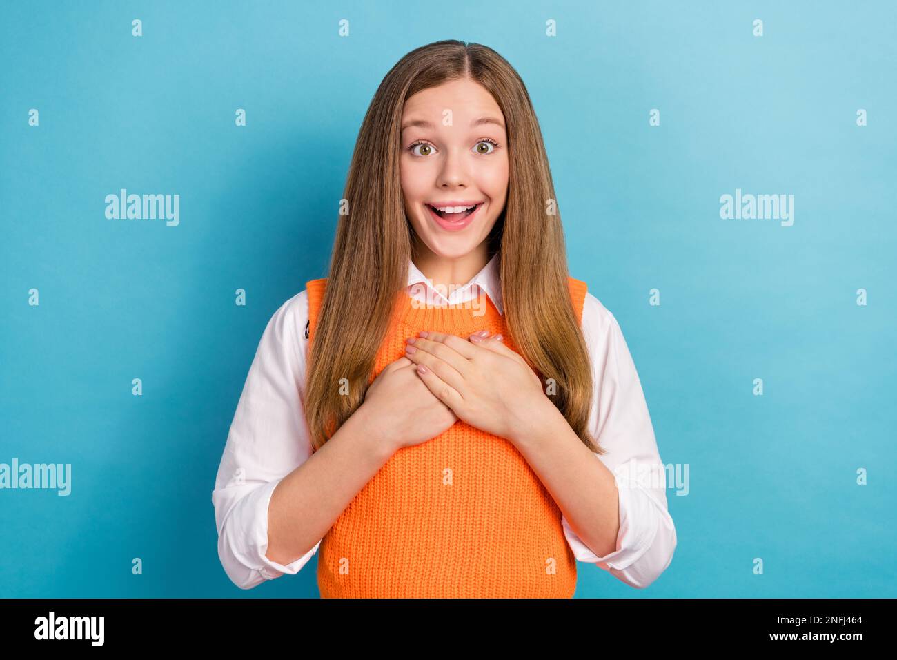 Photo of young overjoyed excited grateful teenage schoolgirl touch ...