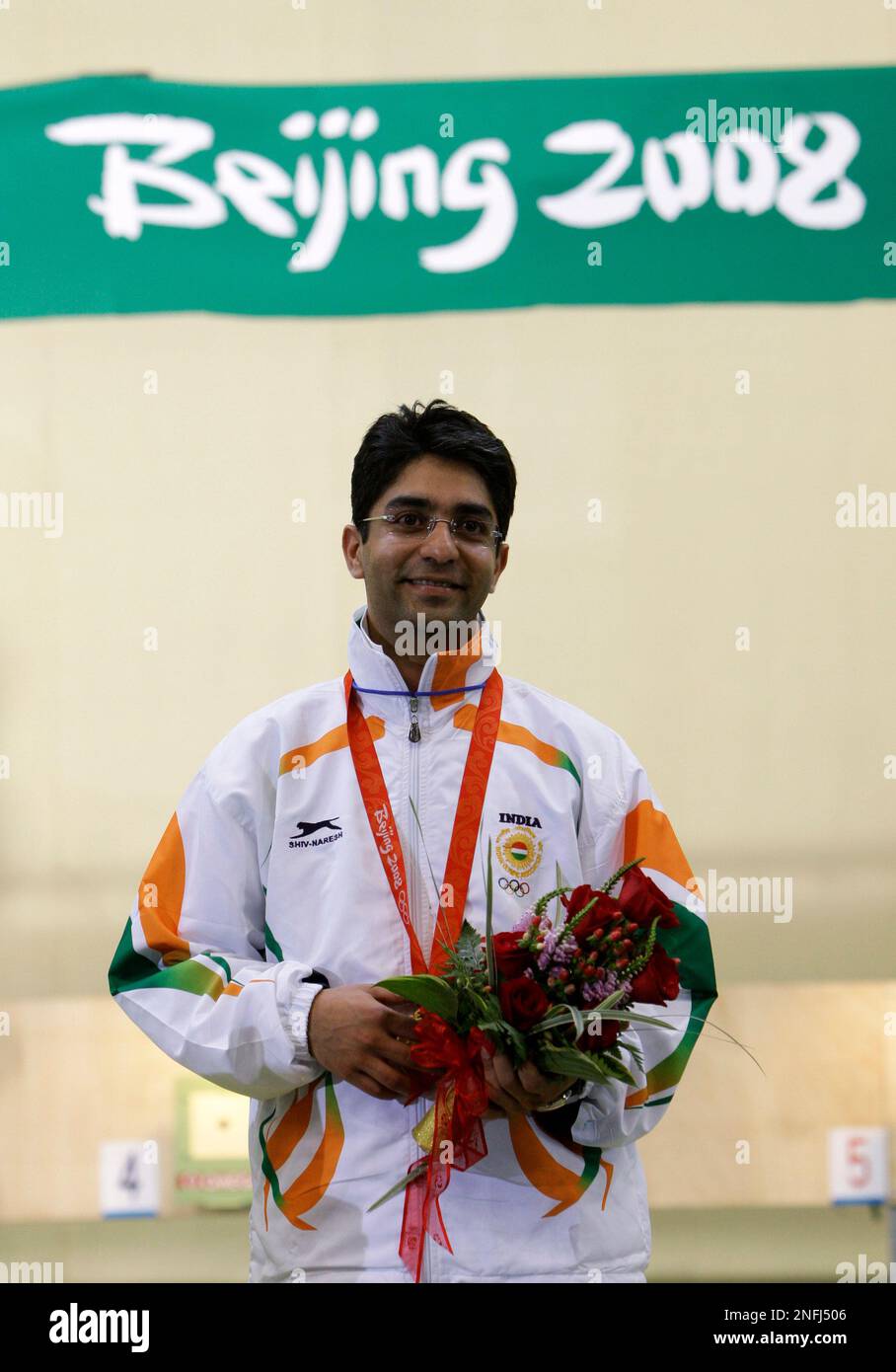 Gold medalist Abhinav Bindra, of India, smiles during the medal ...