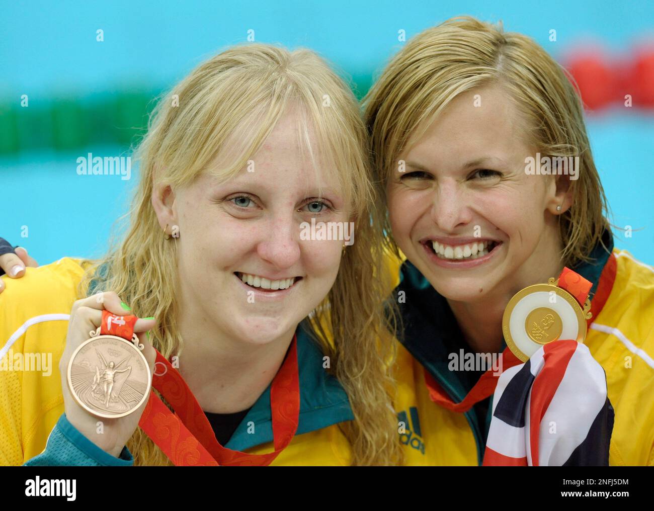 Gold medalist Lisbeth Trickett, right, and her teammate and bronze ...