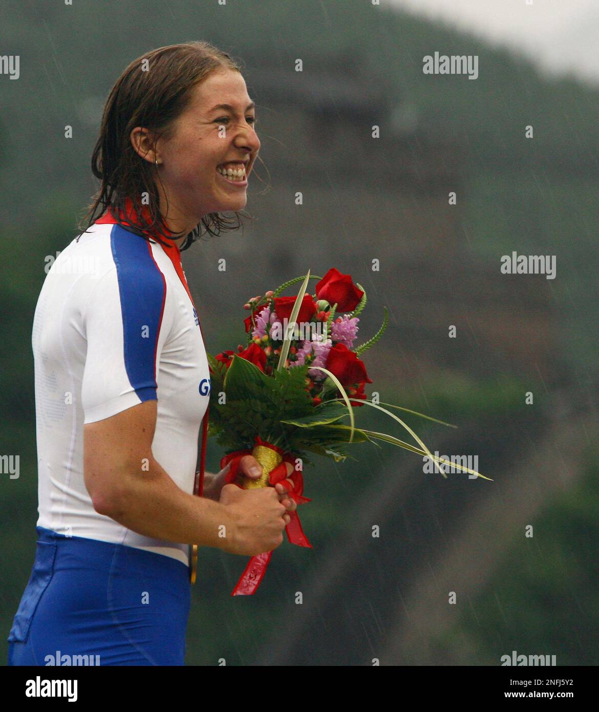 Gold medalist Nicole Cooke of Great Britain smiles as she stands on the ...
