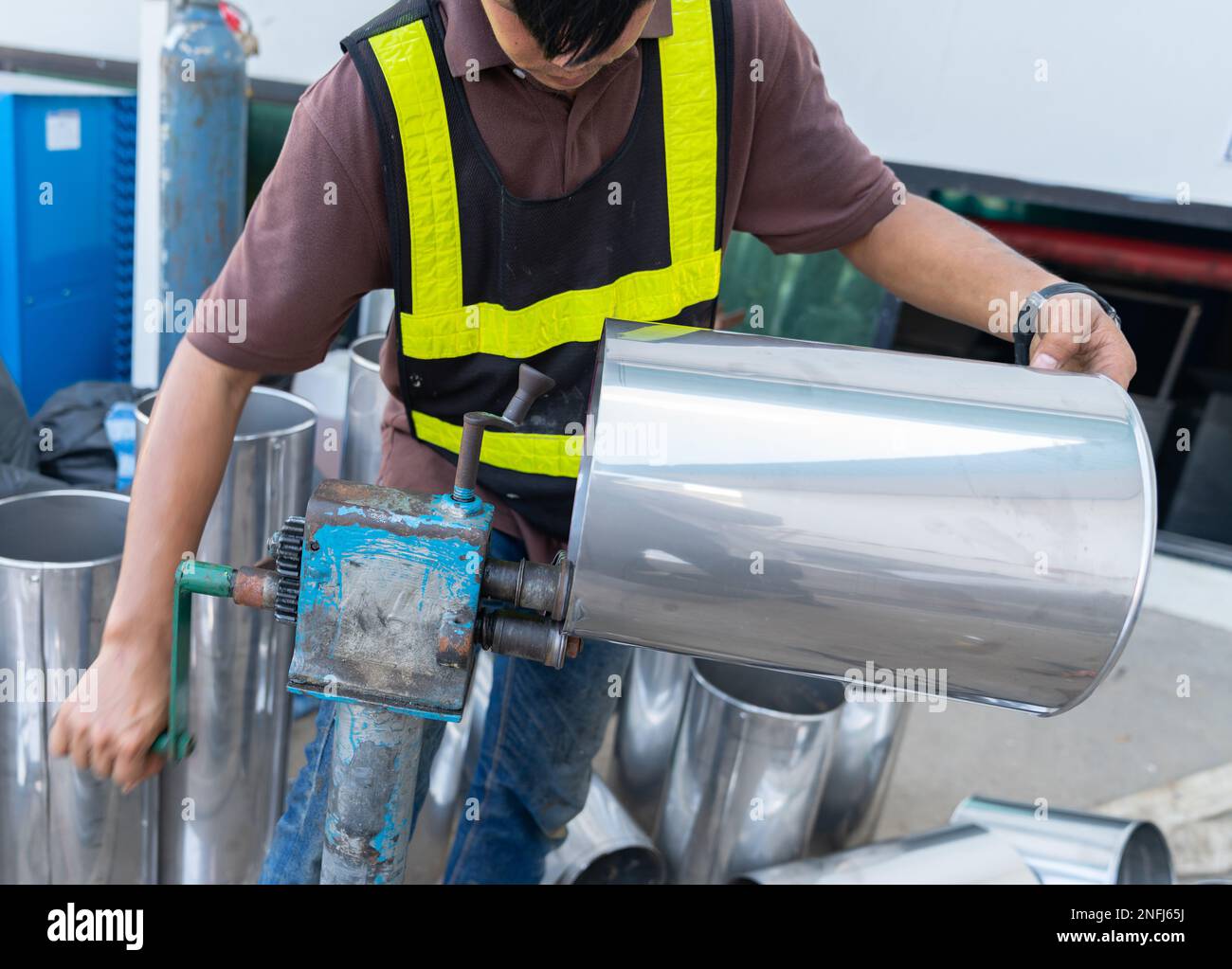 Rolled steel sheet rim on plate rolling machine in factory Stock Photo ...
