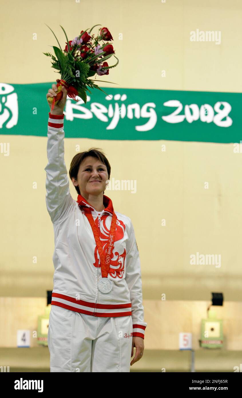 Russia Natalia Paderina celebrates with her medal after the Womens 10 ...