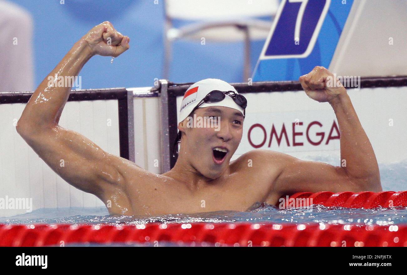 Singapore's Bryan Tay reacts after a men's 200-meter freestyle heat ...