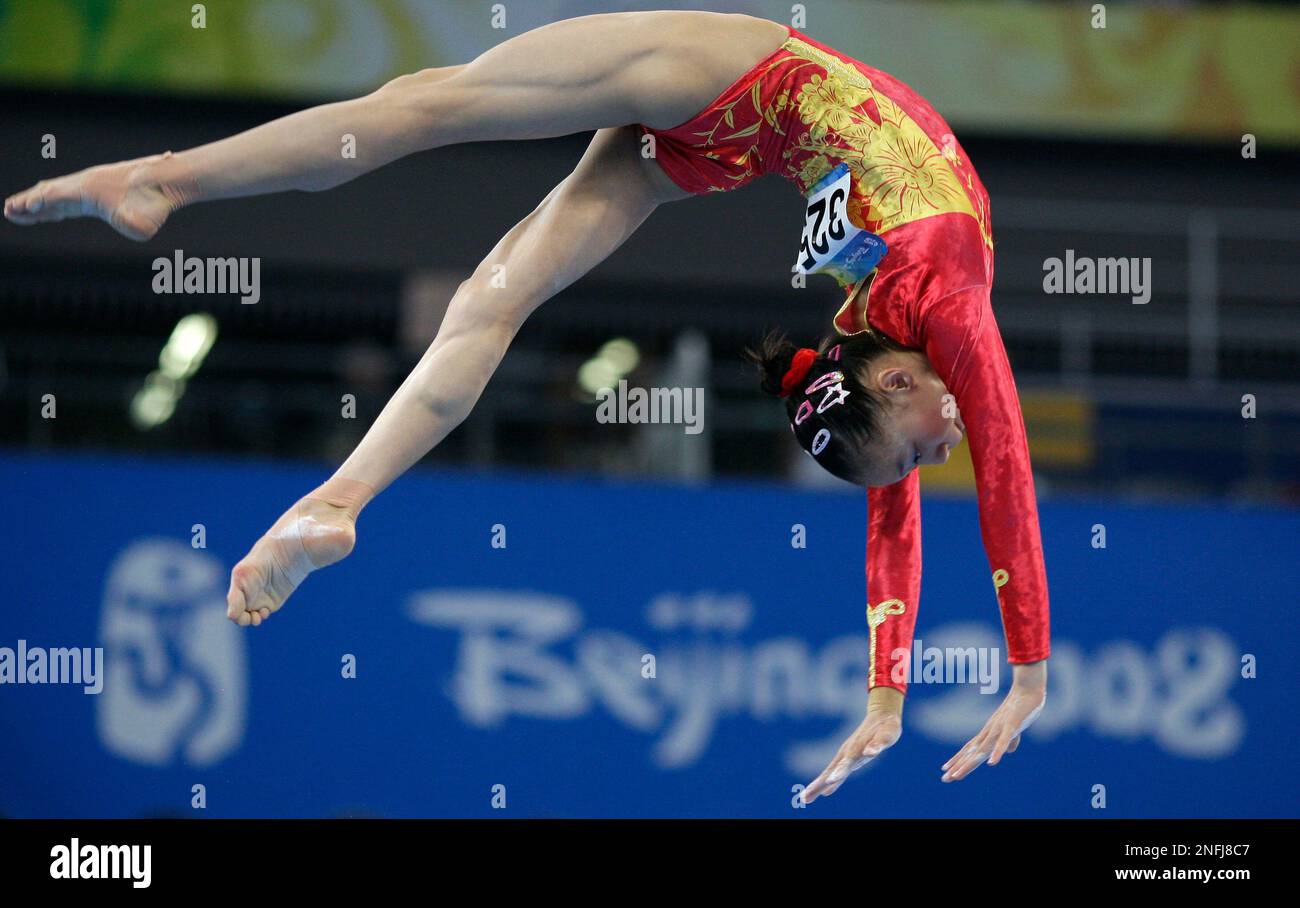 China's gymnast Yang Yilin performs on the balance beam during the ...