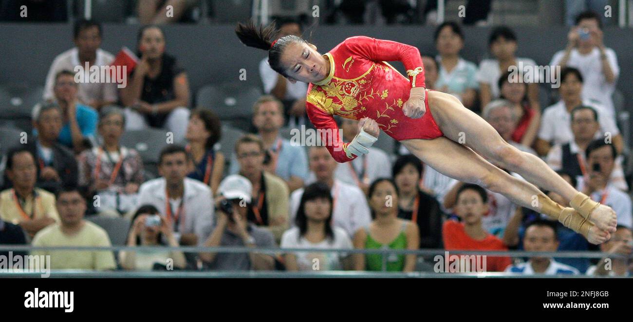 China's gymnast Deng Linlin performs on the vault during the women's ...