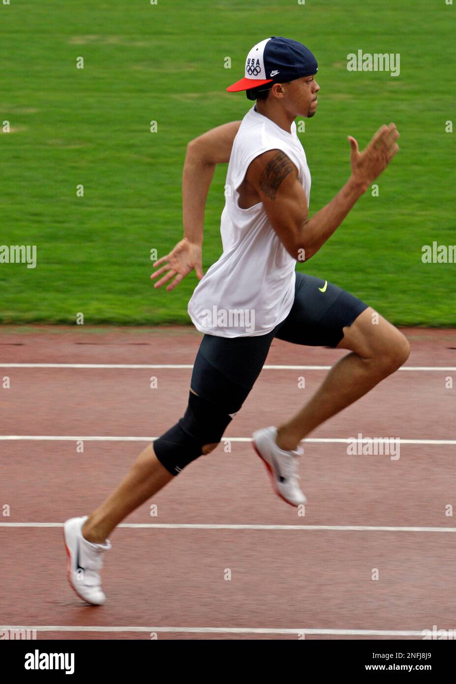 Team USA 200 meter runner Wallace Spearmon trains at the Beijing 2008 ...