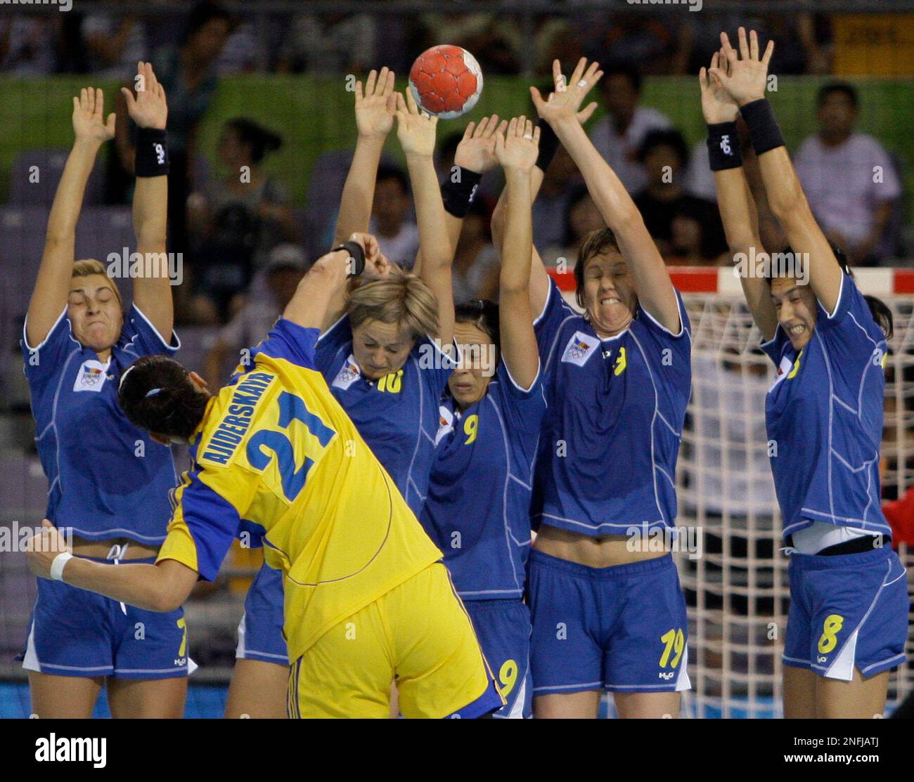 Romanian players line up to block a penalty shoot by Kazakhstan's Olga ...