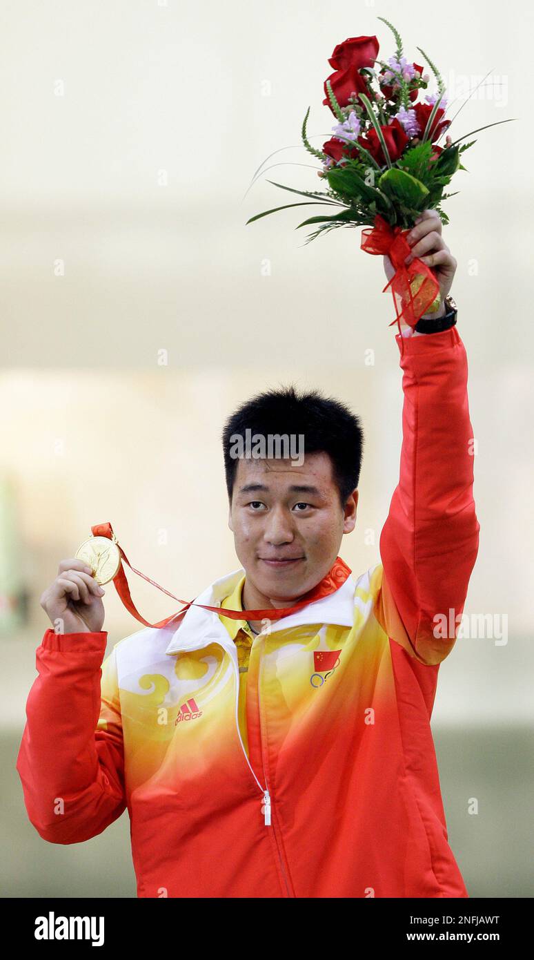 China's Wei Pang celebrates after winning the gold medal in the Beijing ...