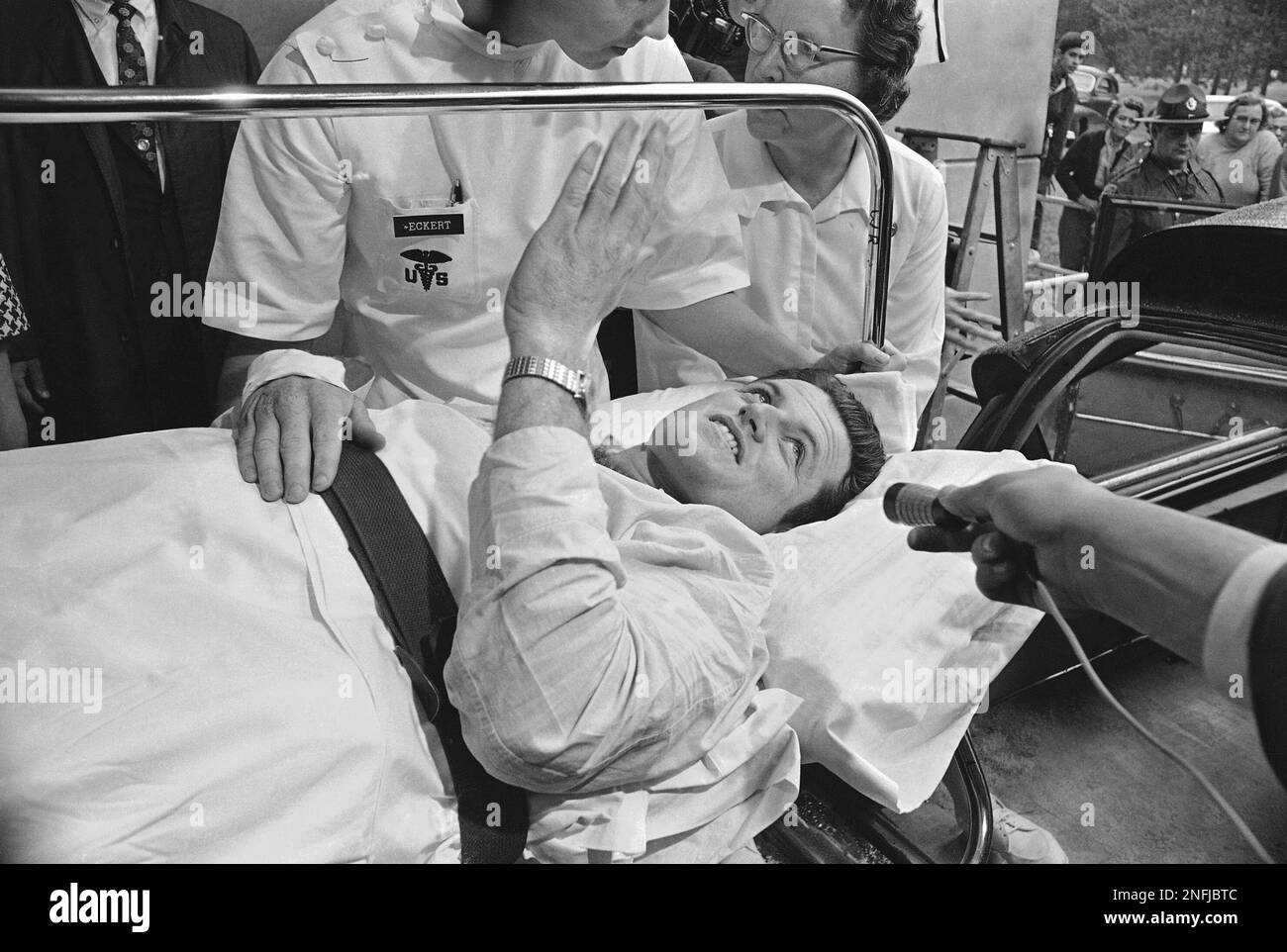 Sen. Edward "Ted" Kennedy (D-Mass) manages a smile and a wave as he ...