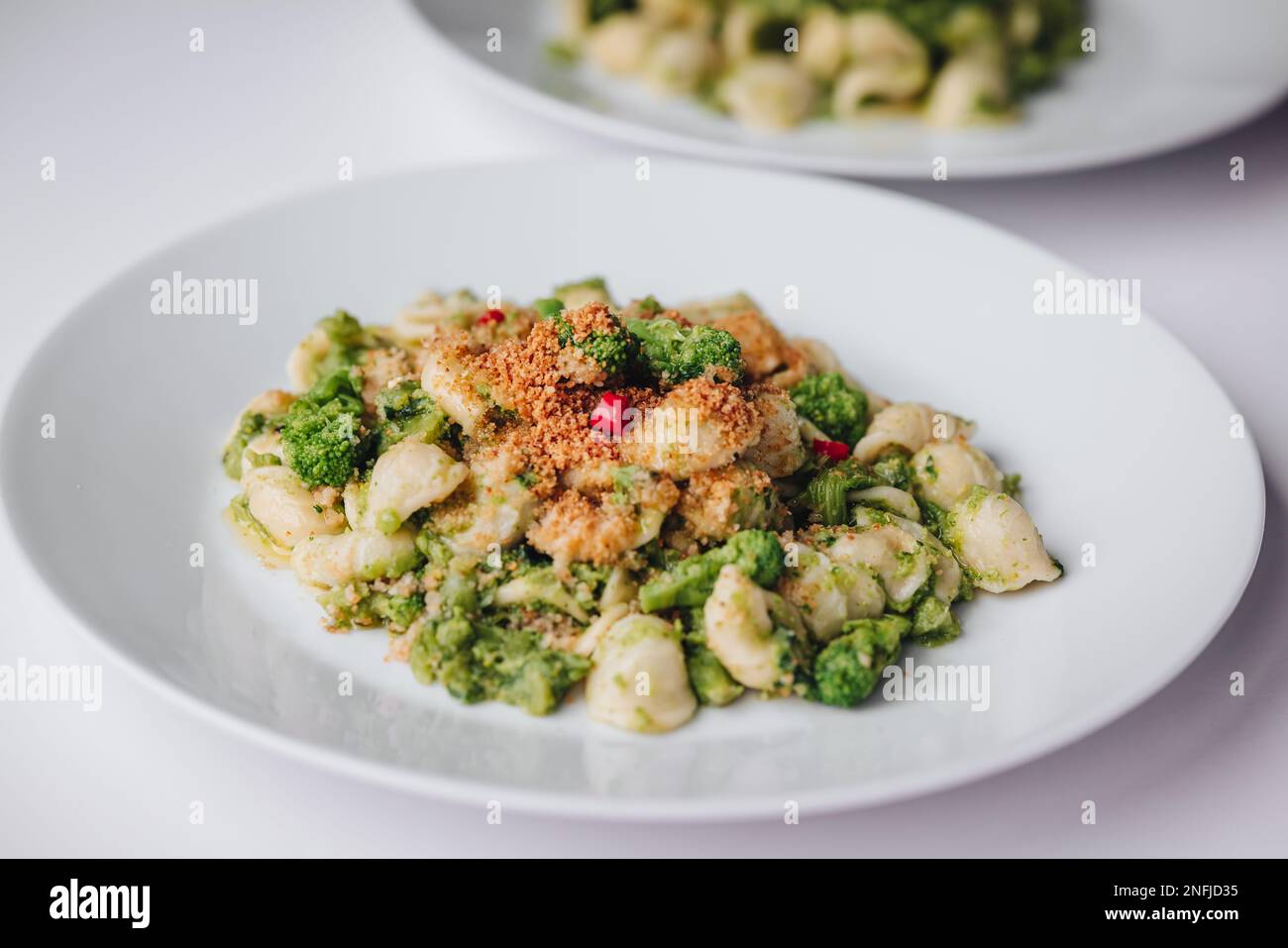 Traditional Orecchiette with cime di rapa pasta from Puglia Stock Photo ...