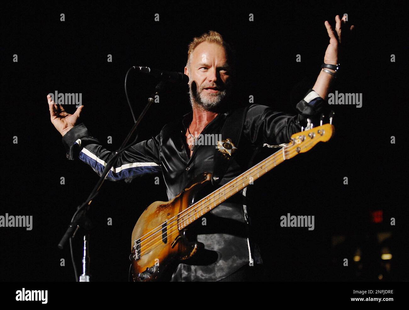 Lead vocalist and bassist Sting and his band The Police perform their ...