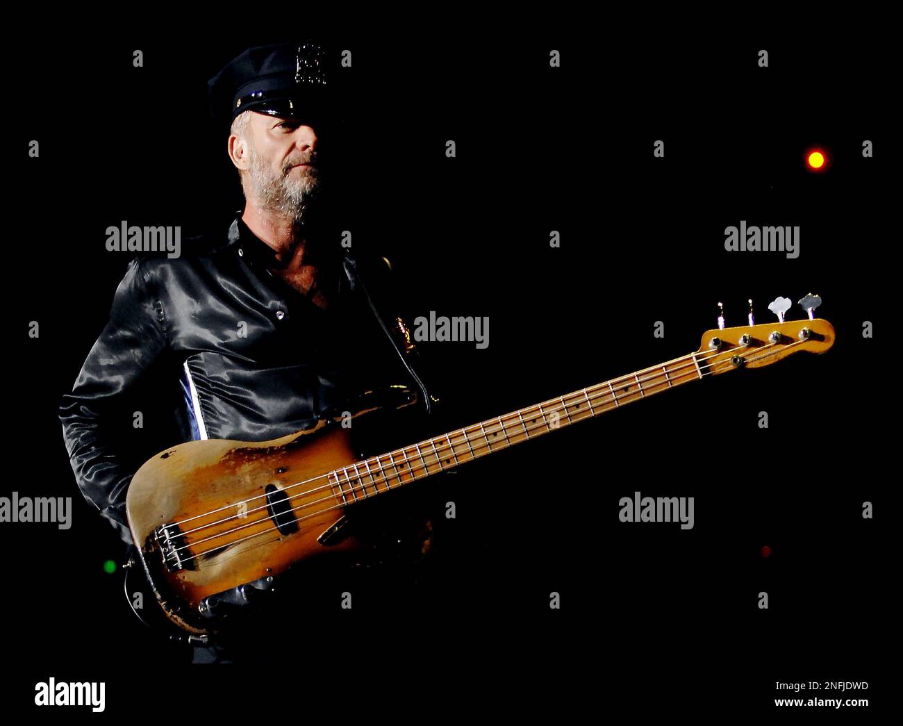 Lead vocalist and bassist Sting and his band The Police perform their ...
