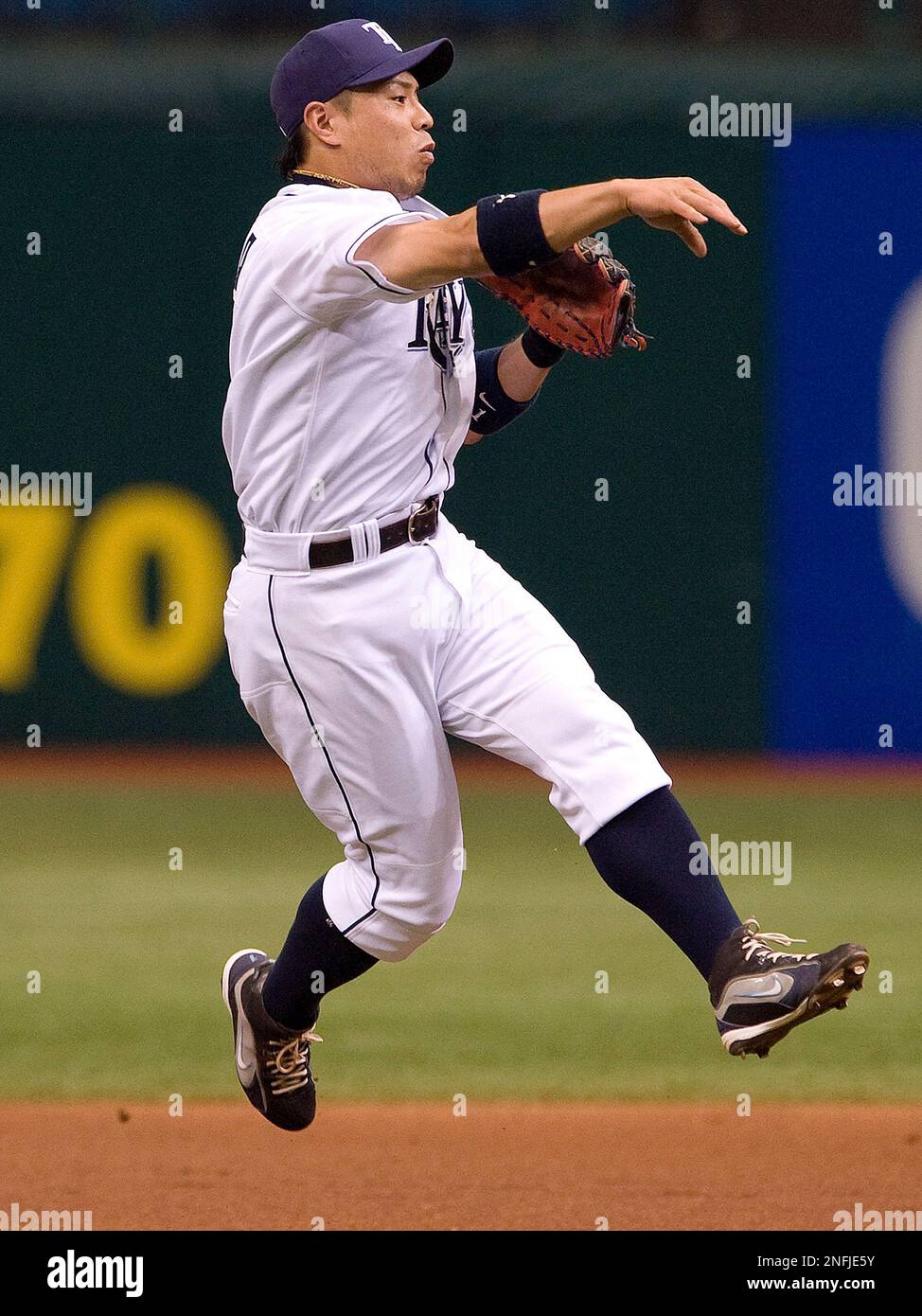 Tampa Bay Rays infielder Akinori Iwamura, of Japan, fields a ball ...