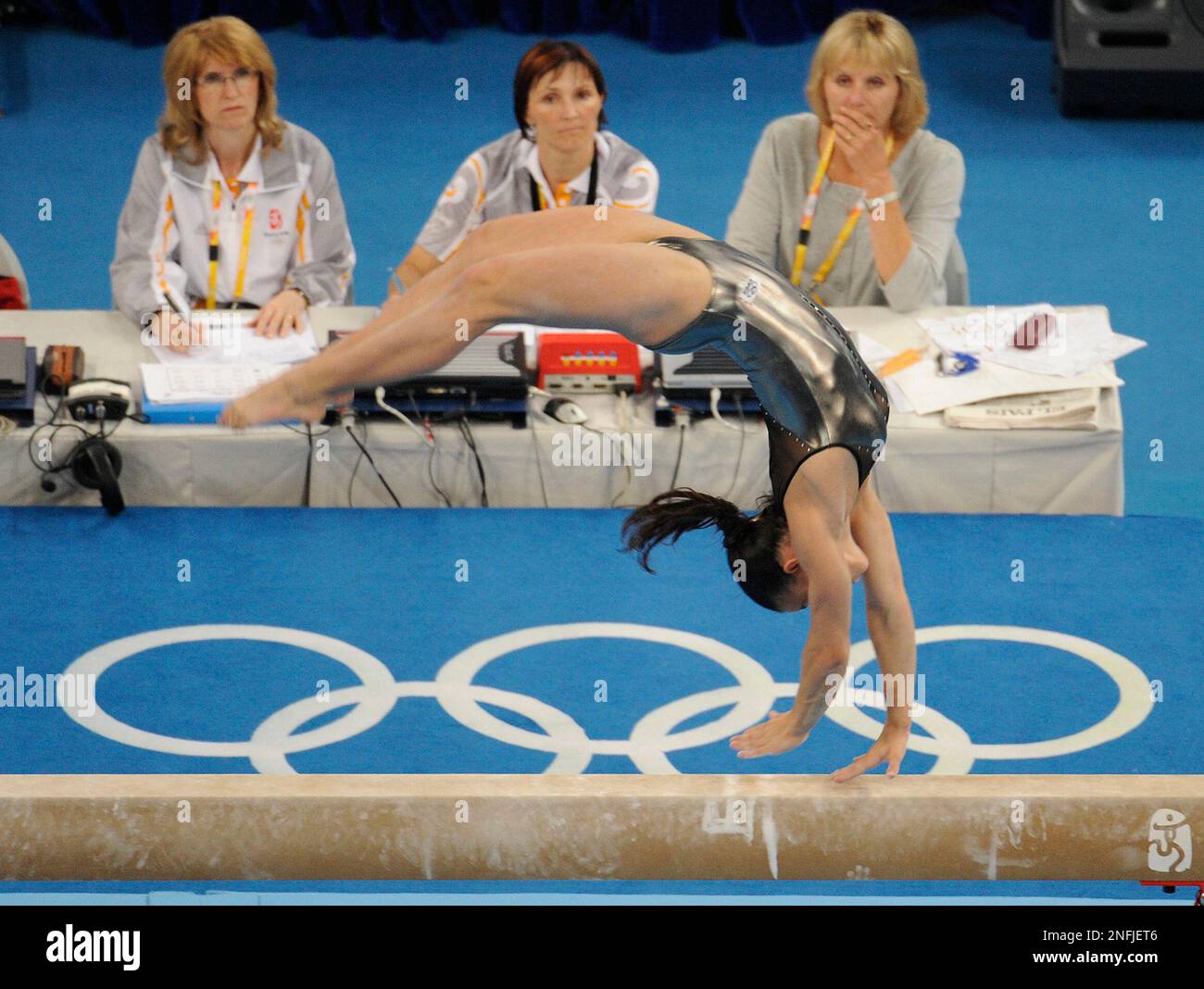 Brazilian"s gymnast Ethienne Franco performs on the balance beam ...