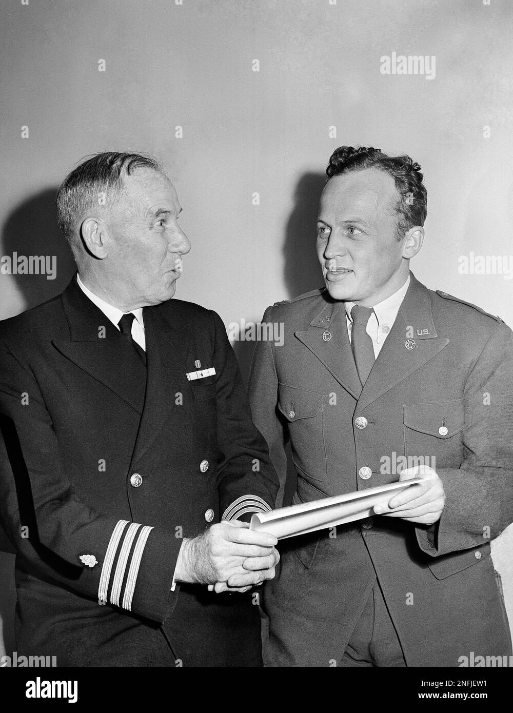 Chicago Daily News noted war correspondent George Weller, right, is ...