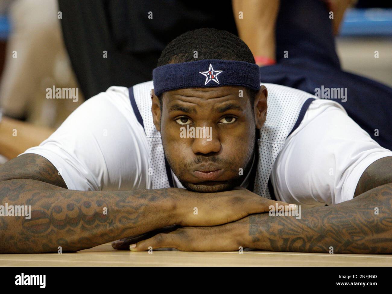 Team USA basketball player Lebron James is shown during stretching ...
