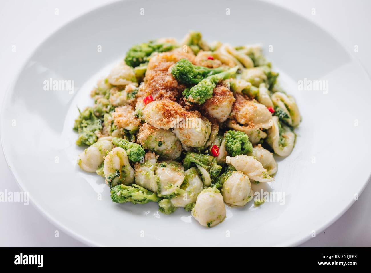 Traditional Orecchiette with cime di rapa pasta from Puglia Stock Photo ...