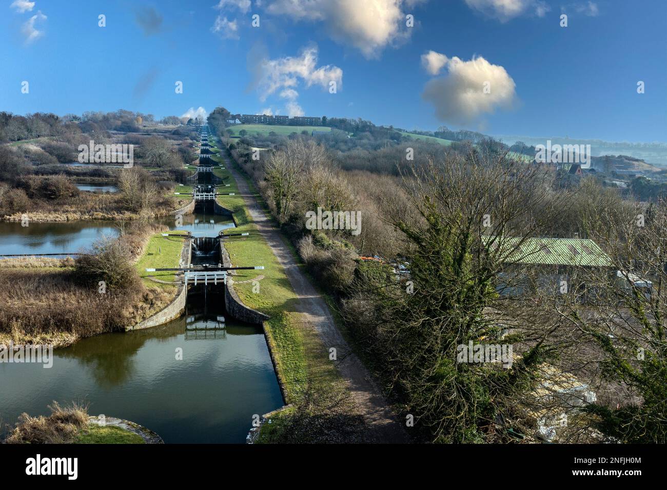 The steep canal system of locks on the Kennet and Avon canal at Caen ...