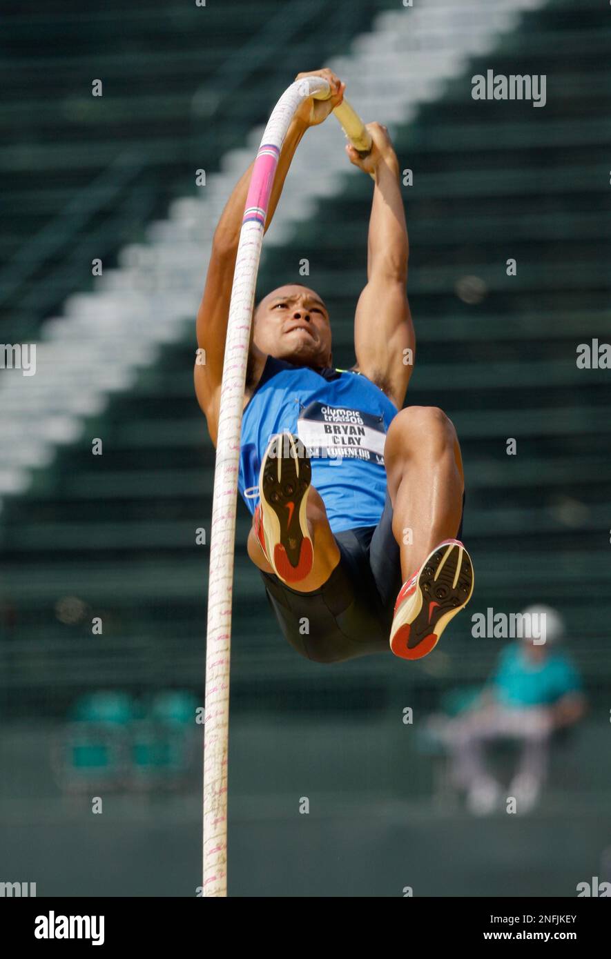 Bryan Clay launches himself during the decathlon pole vault event at ...