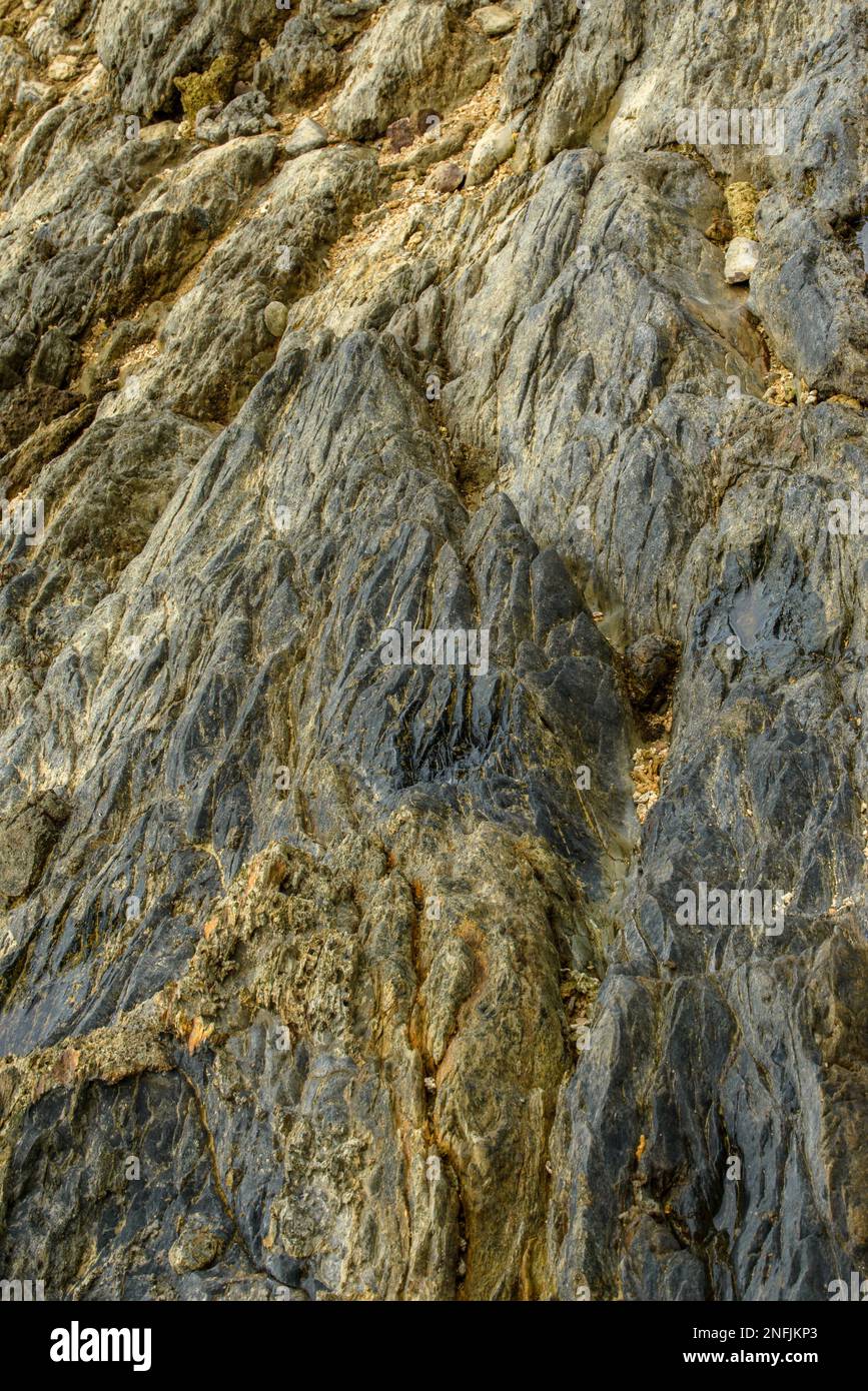 This close-up photo of rocks showcases the rugged, natural beauty of the geological formations ...