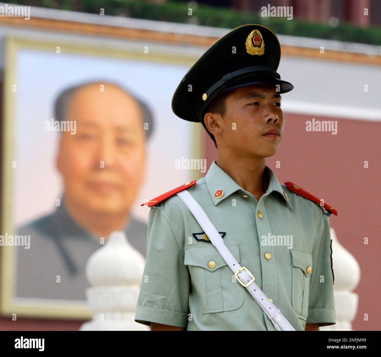 A member of the Chinese military stands guard in Tiananmen Square in ...