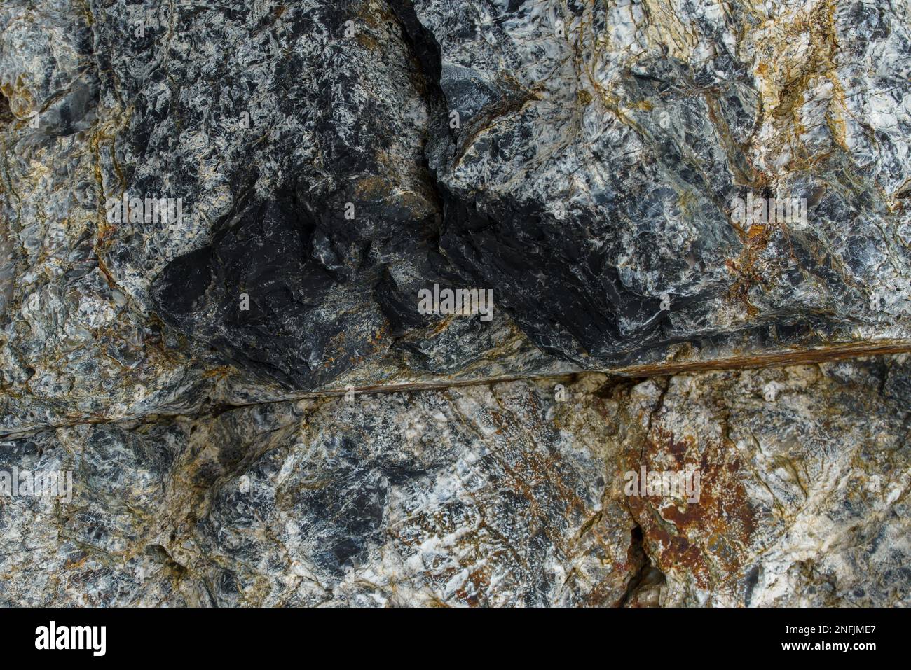 This close-up photo of rocks showcases the rugged, natural beauty of ...