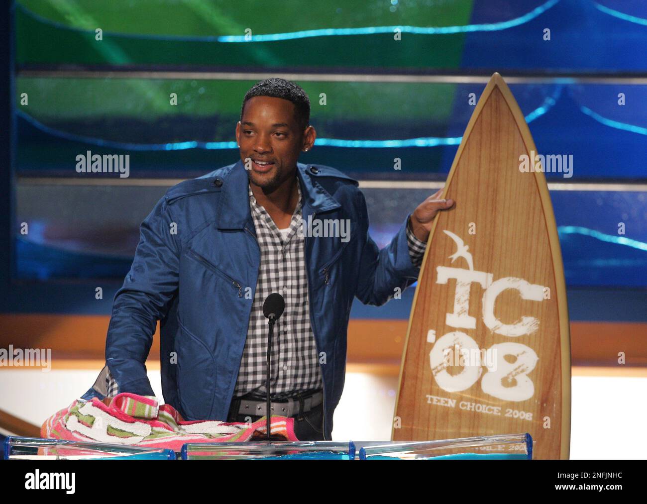 Actor Will Smith accepts the choice summer movie award for an action or ...