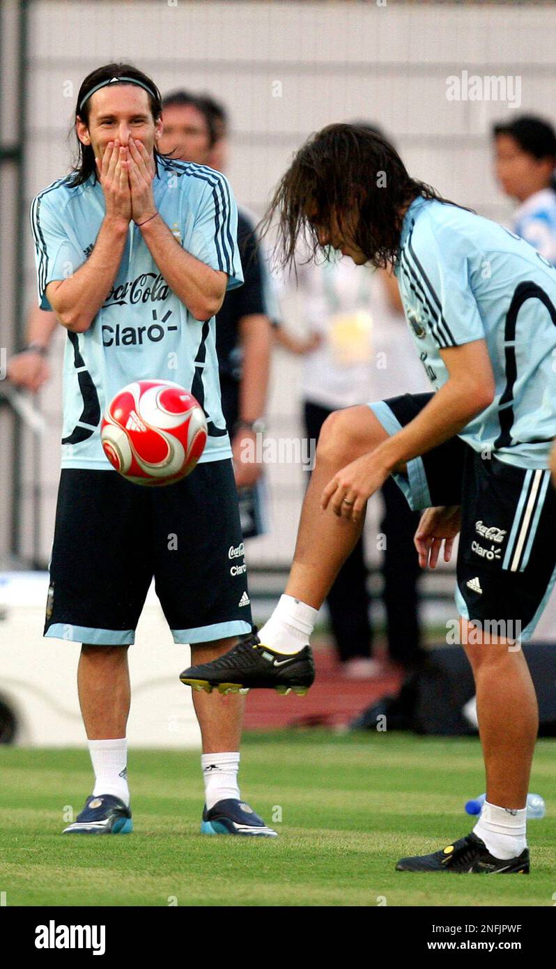 Lionel Messi, left, and Fernando Gago, right, of Argentina men's ...