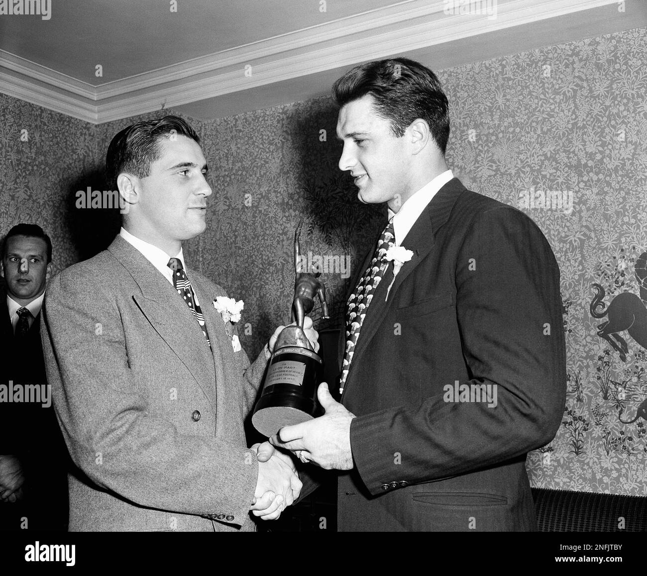 Leon Hart, right, Notre Dame football star, voted the outstanding ...