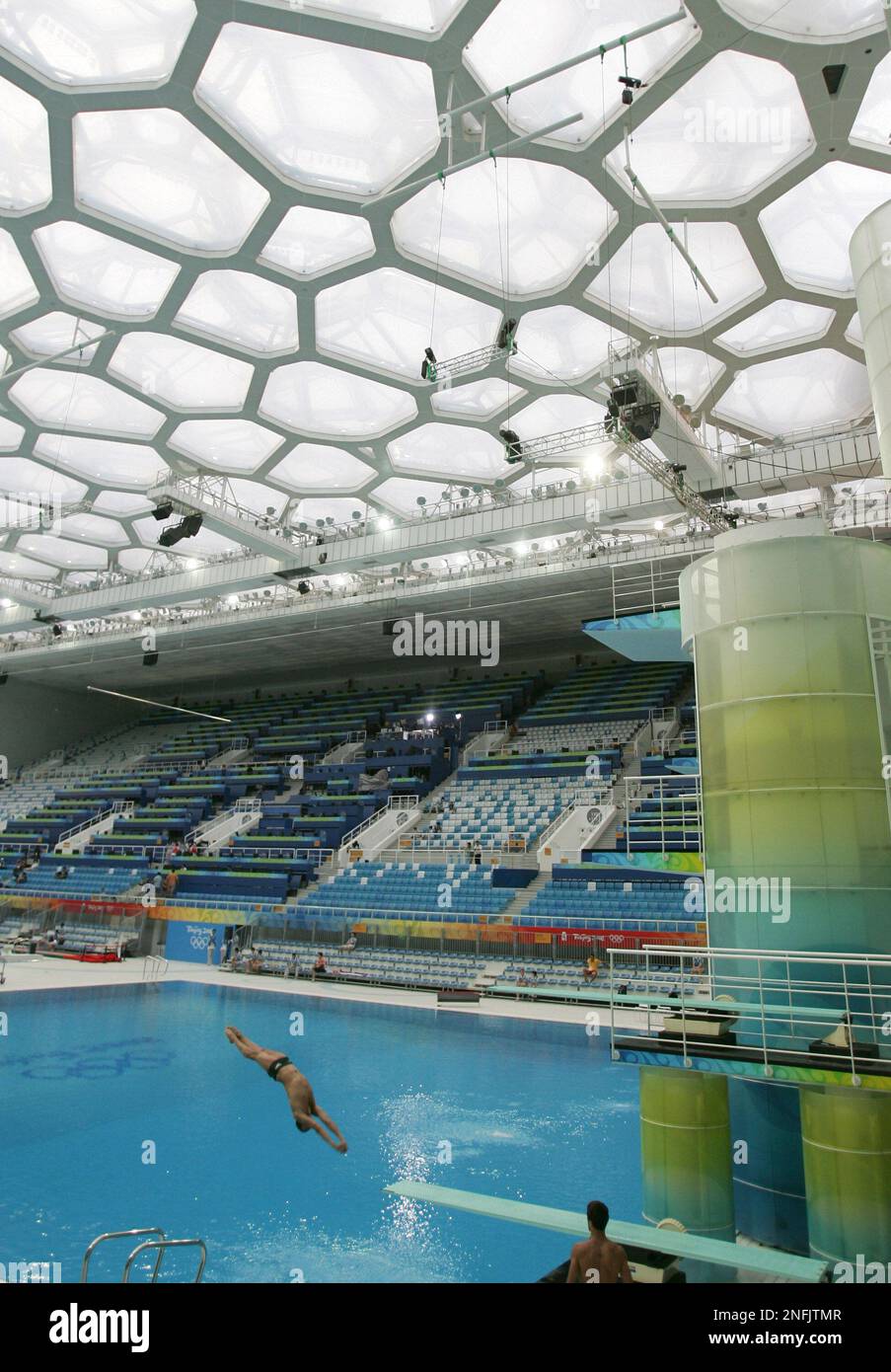 Cesar Castro from Brazil practices his diving routine at the National ...