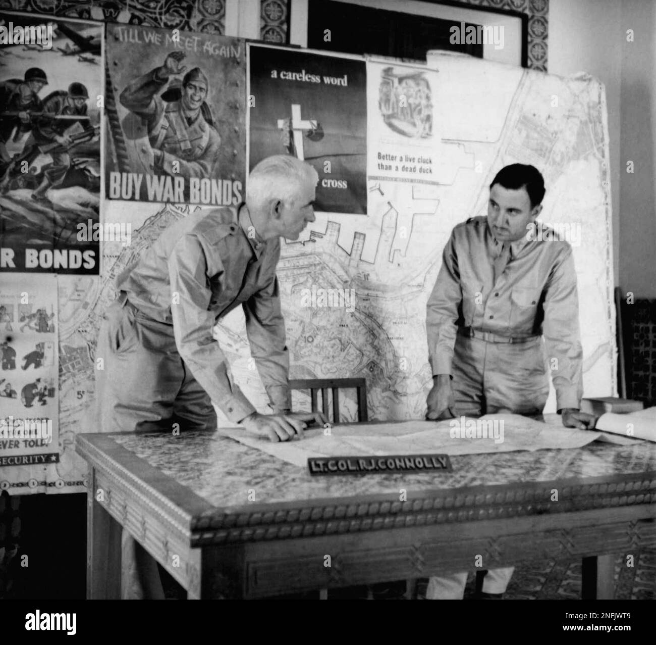 Provost Marshal Lt. Col. R.J. Connolly, (left), of Brooklyn, N.Y., who ...