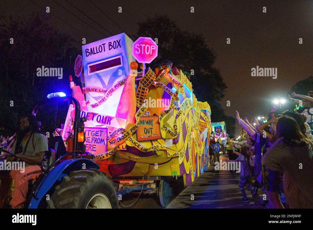 Parade goers and floats are seen at the Knights Of Chaos Parade during ...