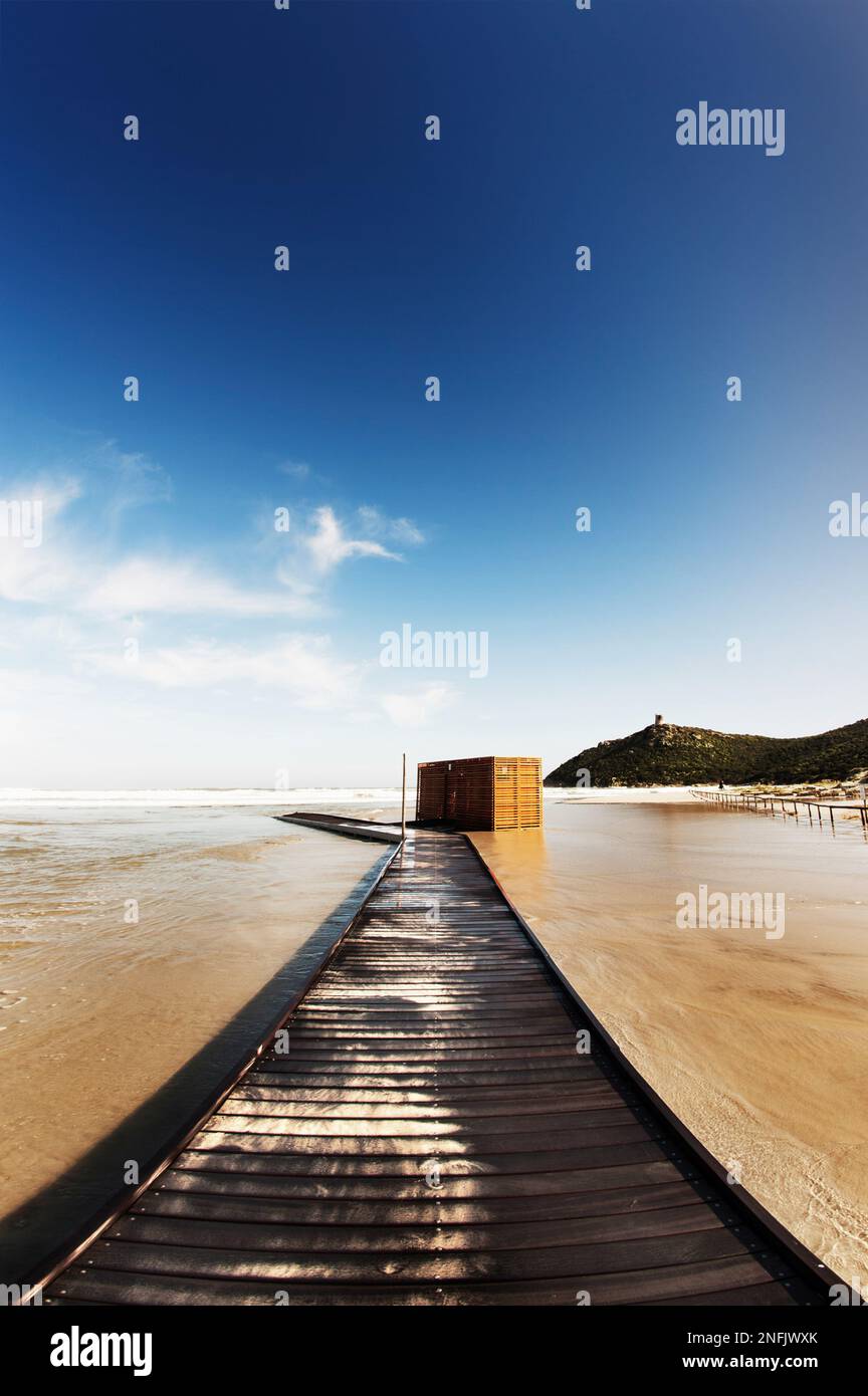 Wooden bridge in the beach - vertical color Stock Photo - Alamy