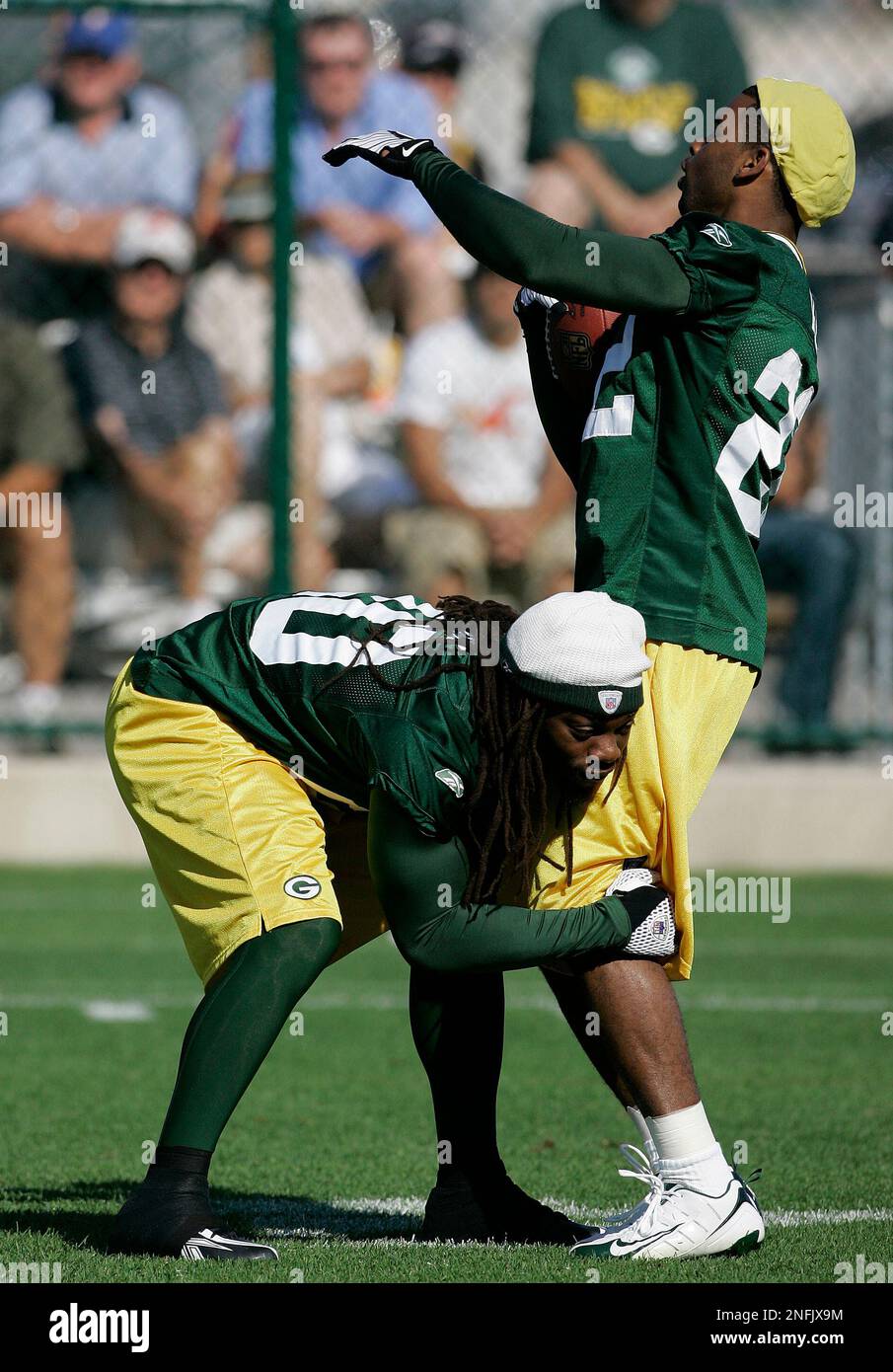Green Bay Packers' Atari Bigby, left, hits Pat Lee during a drill at ...