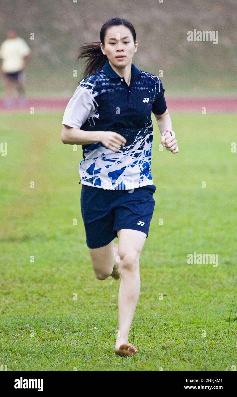 Malaysian Olympic badminton player Wong Mew Choo runs during a physical ...