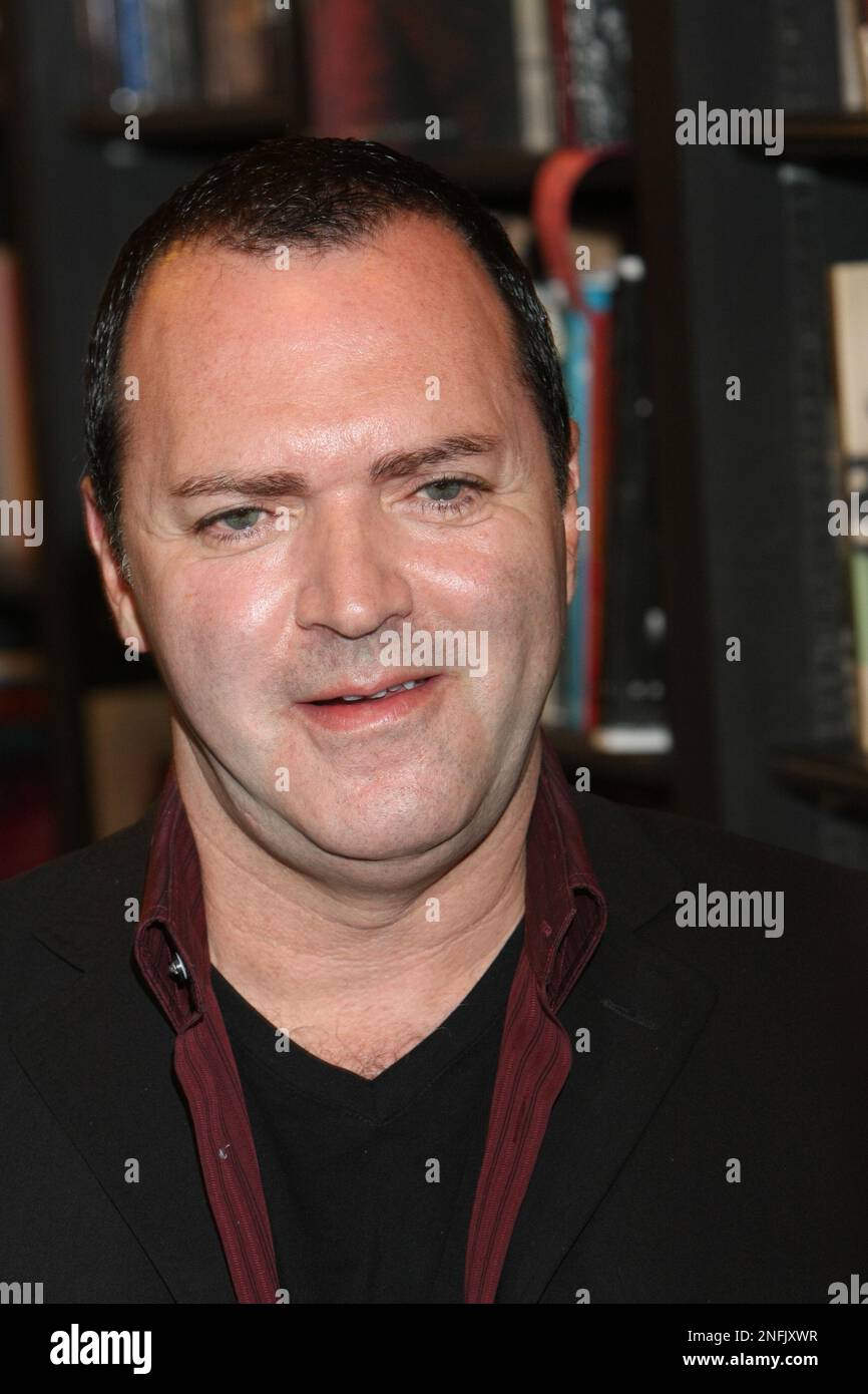 Christopher Ciccone poses with his memoir "Life With My Sister Madonna ...