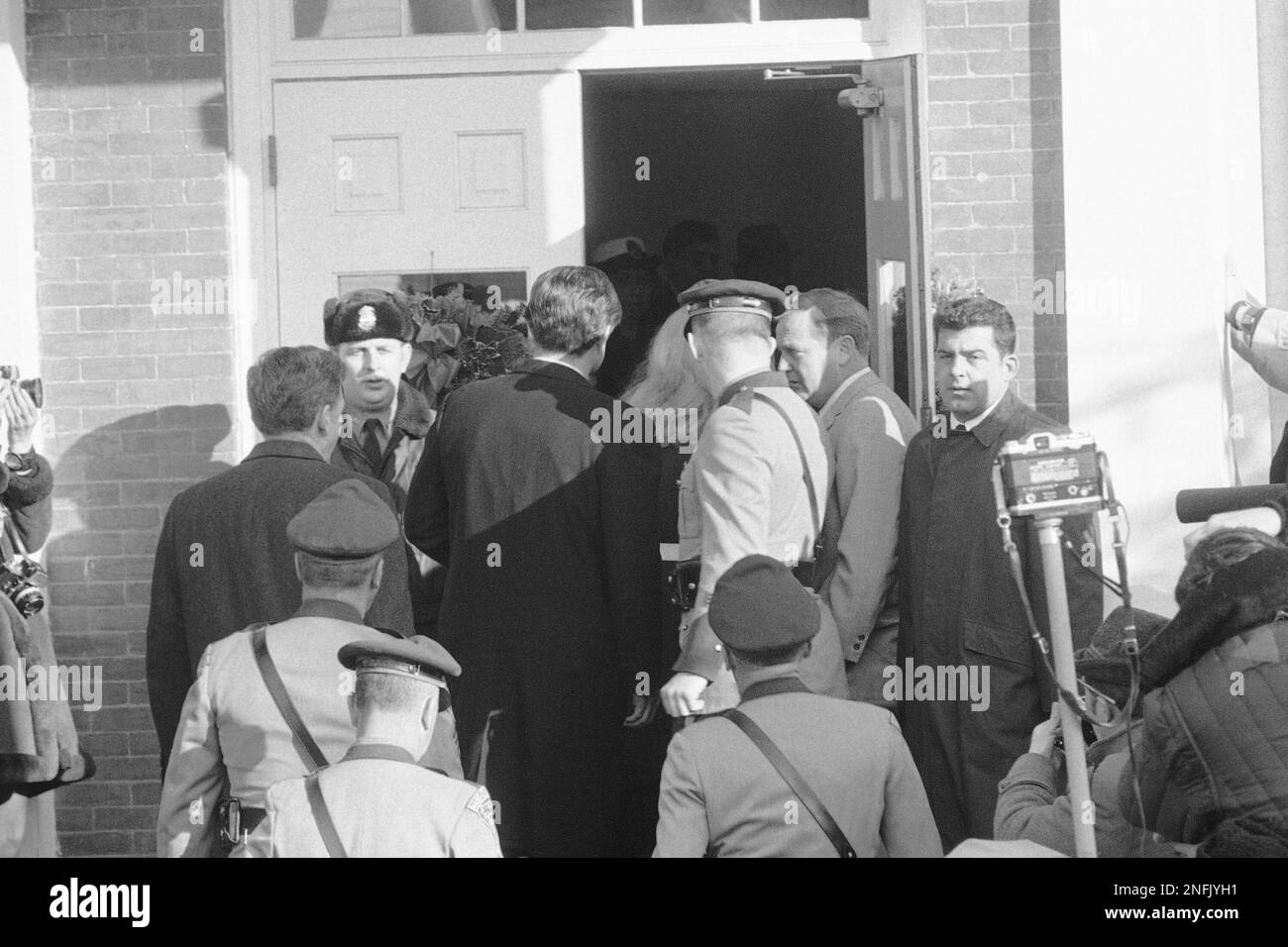 Sen. Edward M. Kennedy and wife Joan enter Dukes County court house in ...