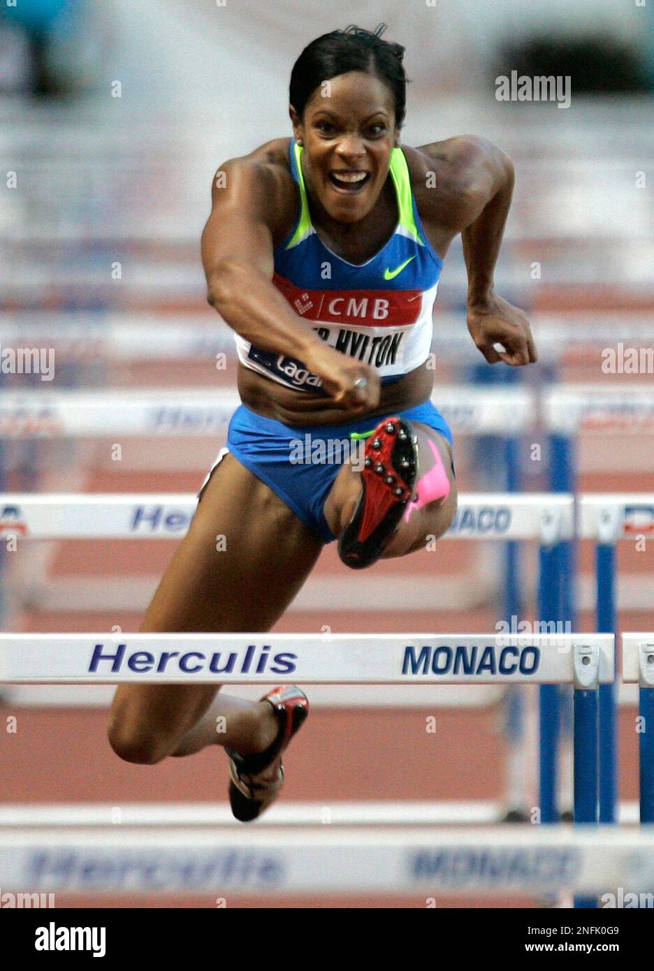 Brigitte Foster-Hylton of Jamaica competes in the women's 100 meters ...