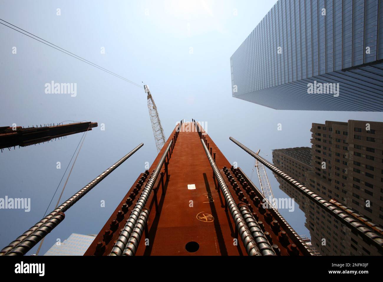 A steel column rises skyward at the Freedom Tower construction site at ...
